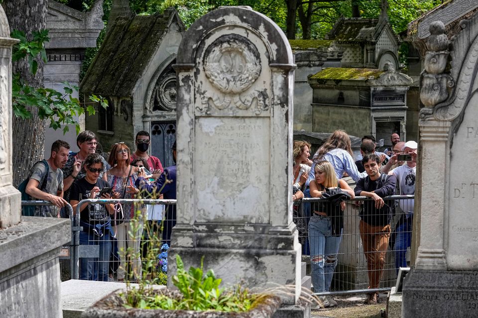 Fans honour Jim Morrison in Paris, 50 years after his death | Irish ...