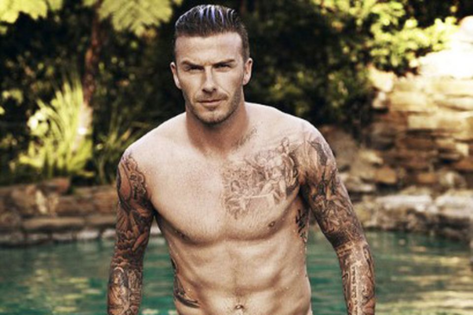 David Beckham gets his kit off again as he goes topless for Elle ...