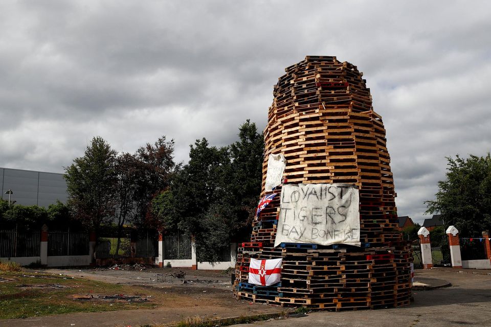 Nationalist residents ‘under siege’ as loyalist bonfires rage | Irish ...