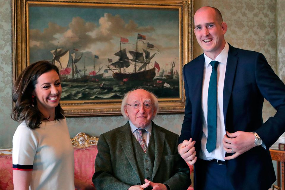 Grand Slam heroes show off silverware at the Áras | Irish Independent