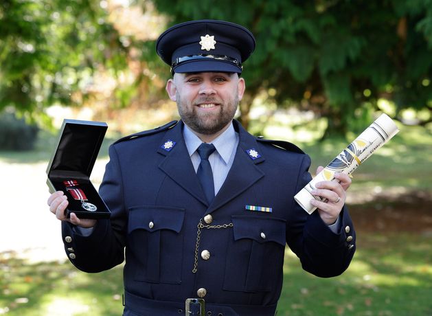 Laois Garda who helped rescue driver from exploding car honoured with ...