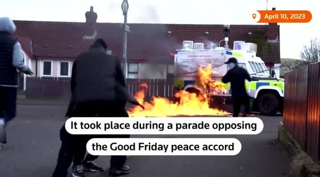 Horrifying video of masked people attacking a police vehicle with ...