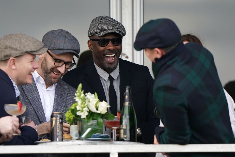 Idris Elba and Luke Evans sport flat caps on final day of Cheltenham ...