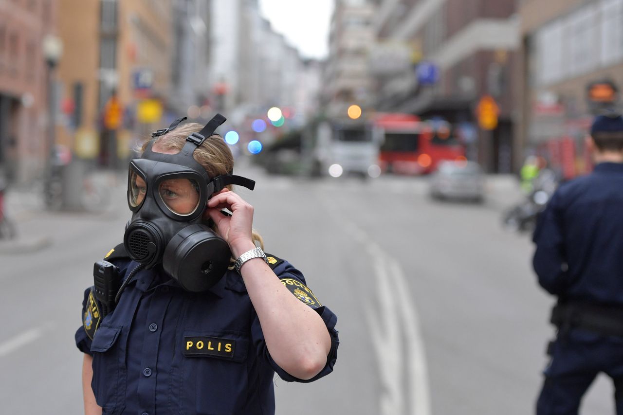 In Pictures: Stockholm in lockdown after truck rams into shopping ...