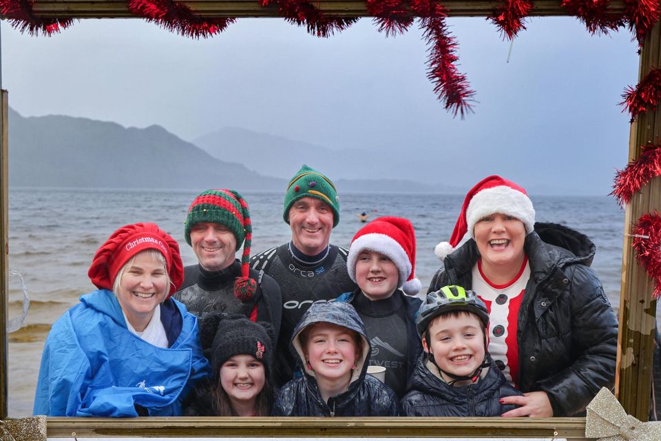Pictures show swimmers braving the cold for a good cause on Christmas ...
