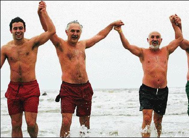 Swimmers brave sub-zero water for Chernobyl Fund | Irish Independent