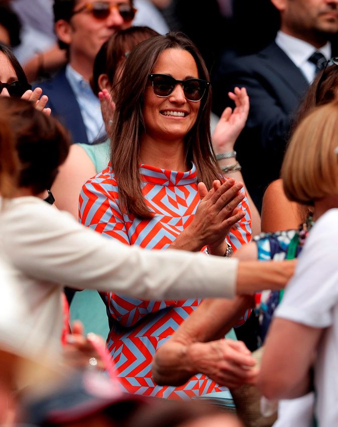 Pippa Middleton cuts a stylish figure in patterned pink as she leads ...