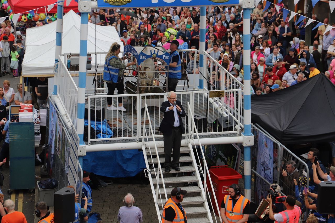 Photos of the crowning of King Puck as thousands line the streets of ...
