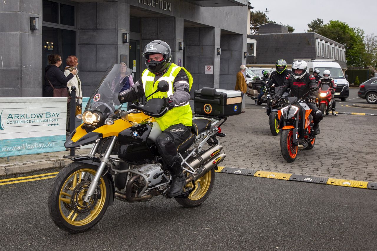 Photos show community spirit at East Coast Roosters Motorcycle Club run ...