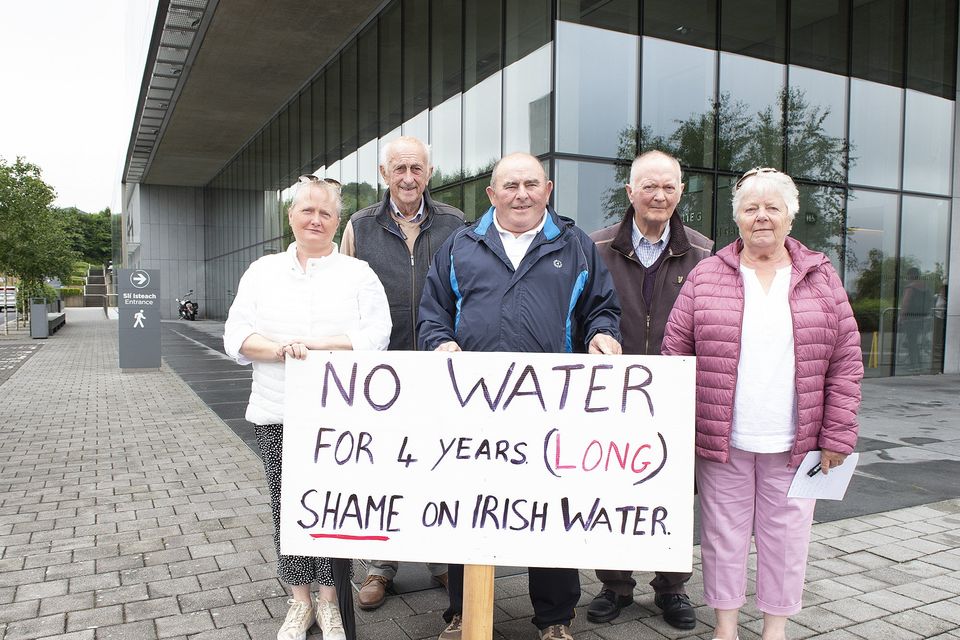 Wexford pensioner protests outside County Council meeting about lack of ...