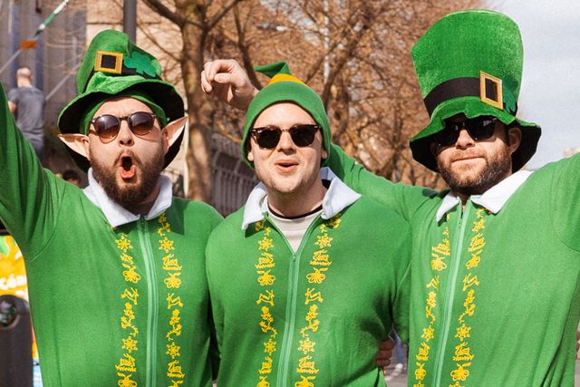 Tourists soak up the warm atmosphere at St Patrick's Day Parade in ...