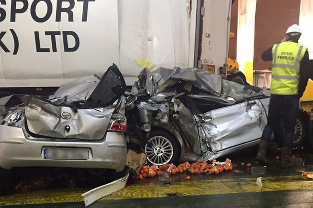 Mangled cars and overturned trucks - Incredible pictures reveal damage ...
