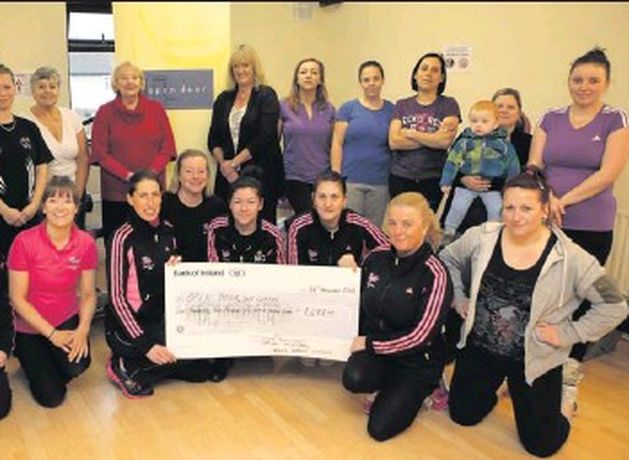Workout Express ladies hand over cheque | Irish Independent