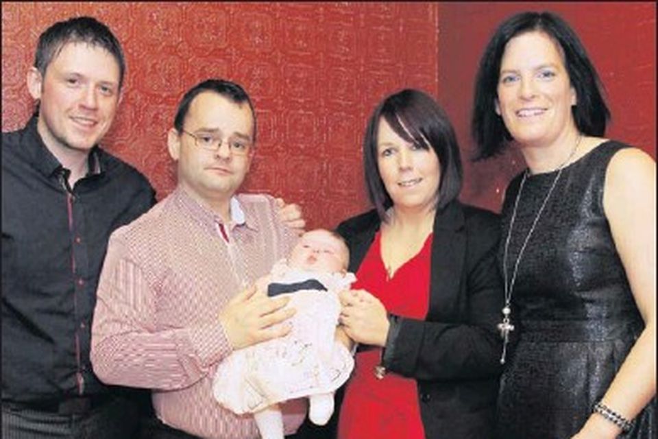 Mia the star of the show on a special Christening day | Irish Independent