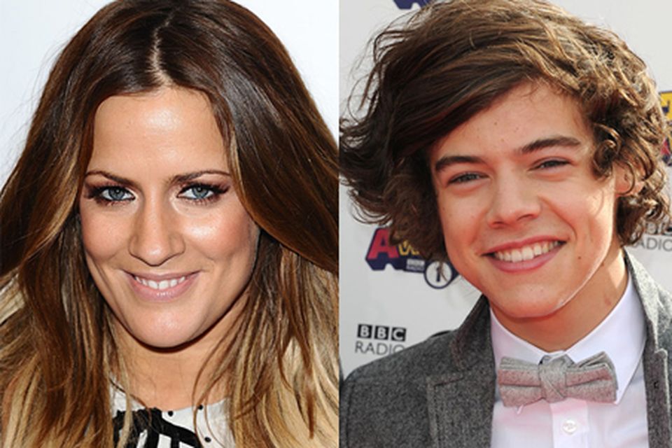 One Direction's Harry Styles minds the gap as he gives Caroline Flack ...