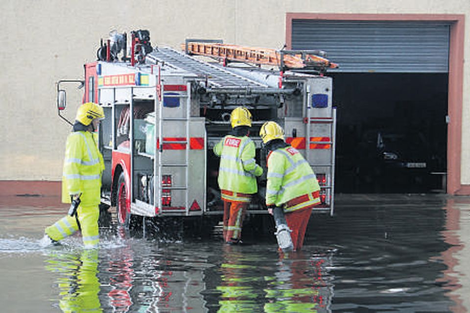 Mum and daughter rescued after flash flooding in town | Irish Independent