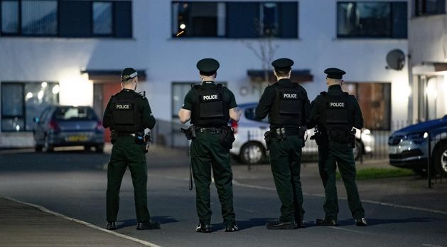 UDA feud: masked men strip murals and plaques from walls of housing ...