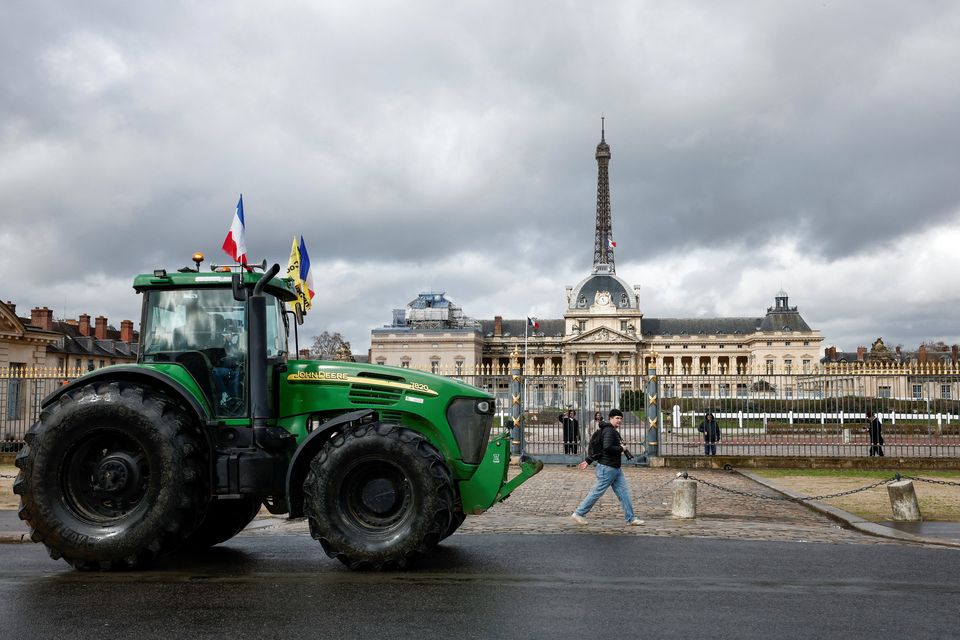 French farmers take tractors back to Paris streets in new protest ...