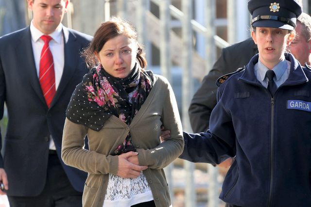 Woman charged with murder after car plunge | Irish Independent