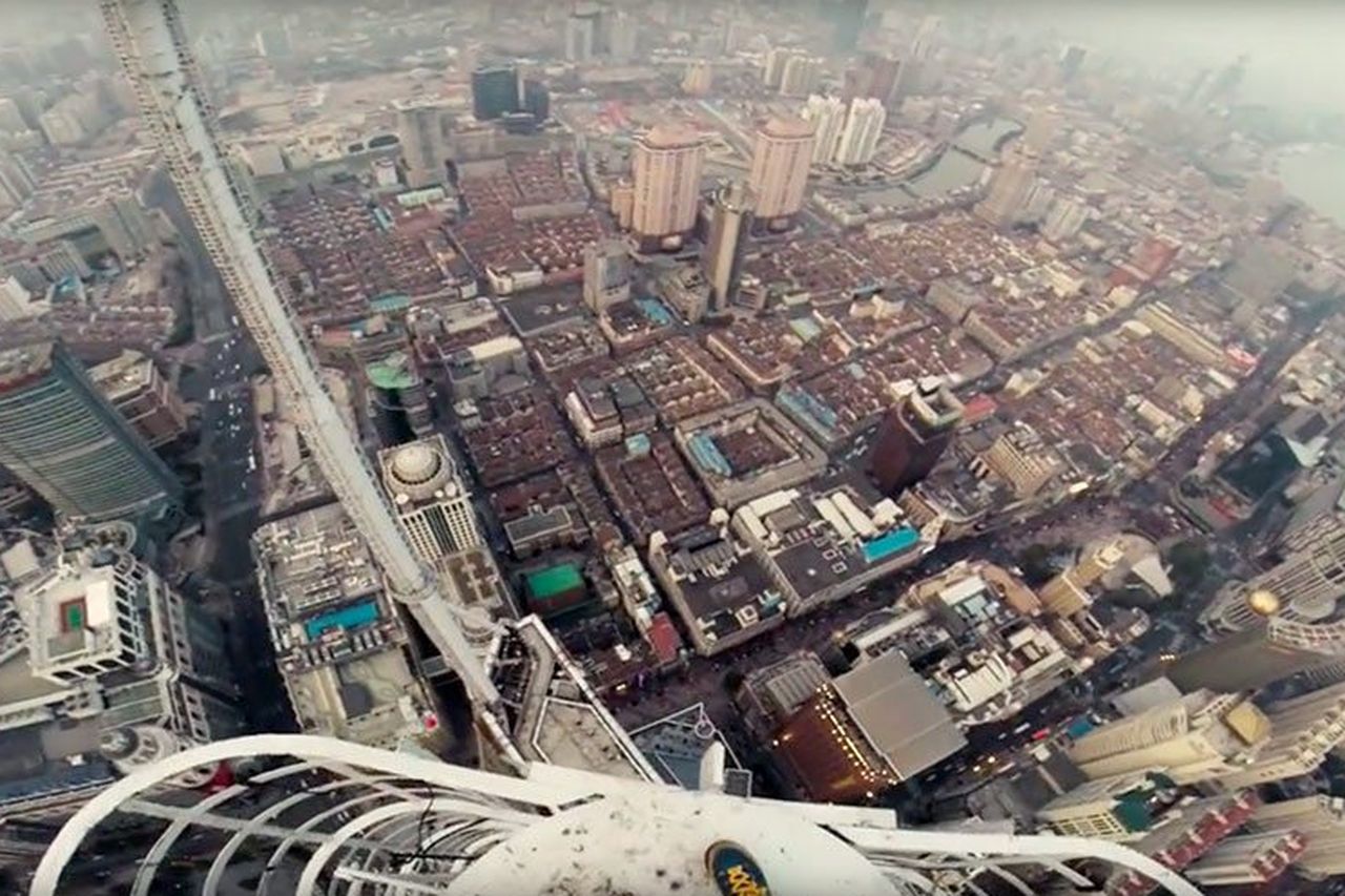 Watch: Daredevils battered by high wind as they scale 80m spike atop of ...