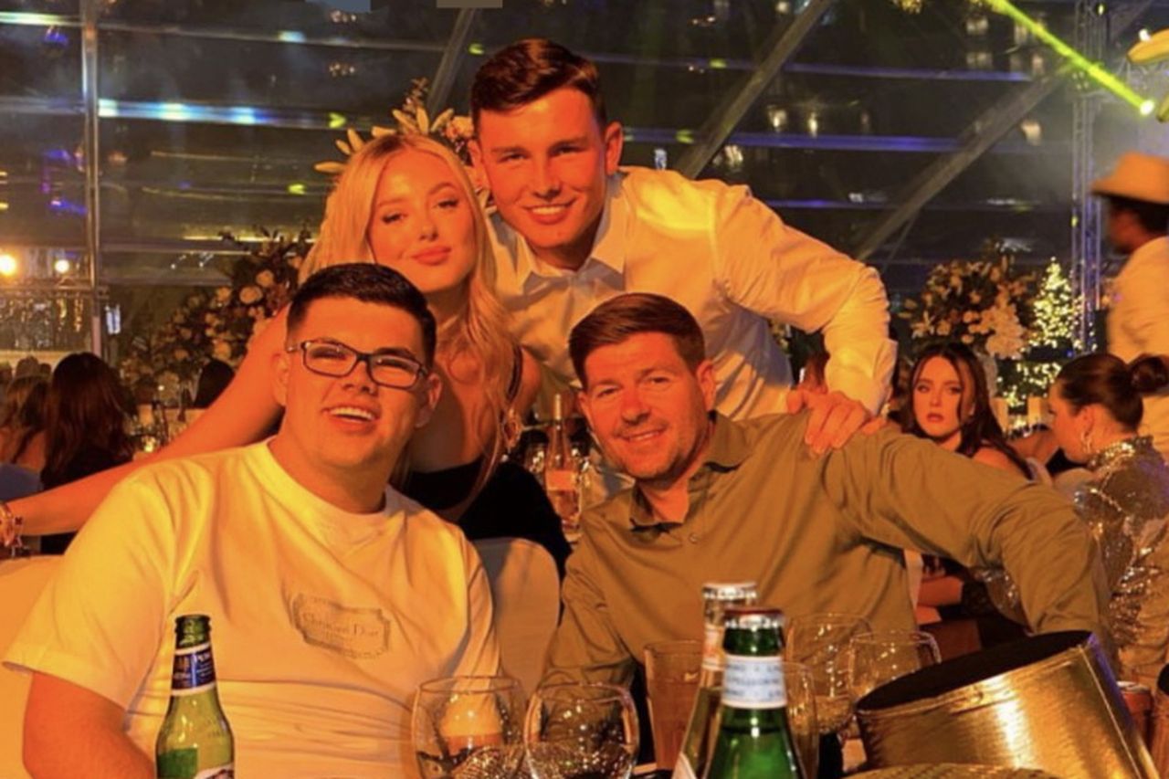 Liverpool legend Steven Gerrard pictured posing with junior associate ...