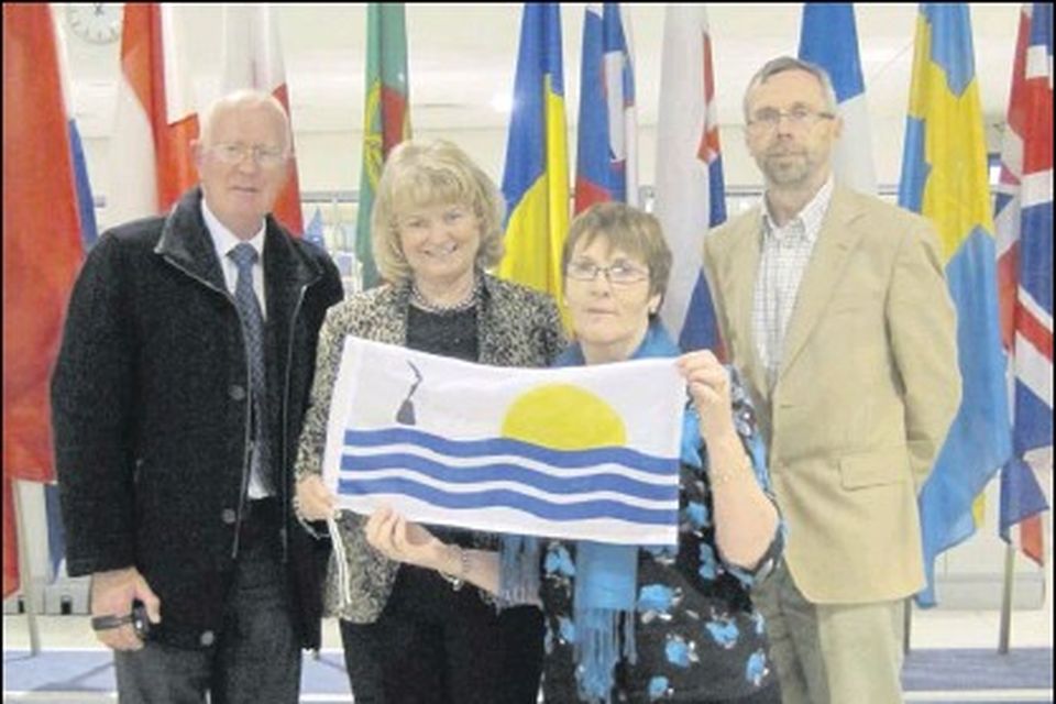 Tidy towns group fly the Blackrock flag in Brussels | Irish Independent