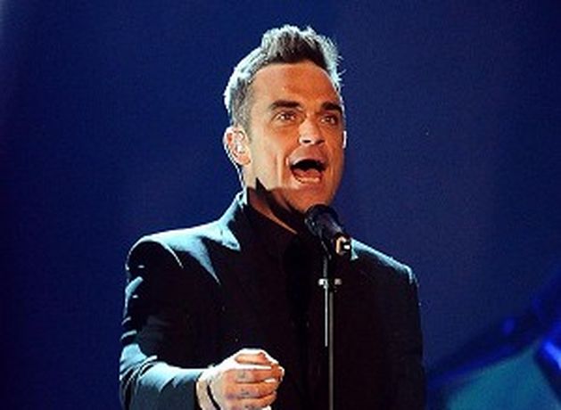 Robbie illness stops Take That show | Irish Independent