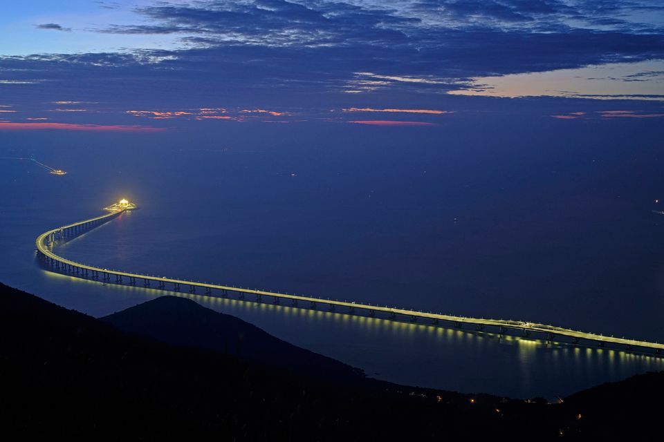In Pictures: China opens world's longest sea bridge linking Hong Kong ...