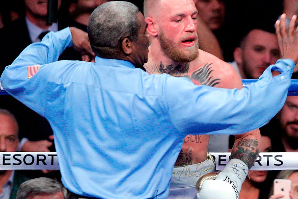 Conor McGregor v Floyd Mayweather stopped due to 'mild traumatic brain ...