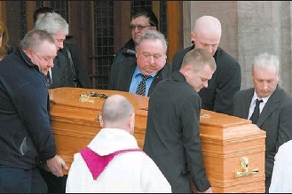 Murder casts shadow on community | Independent.ie