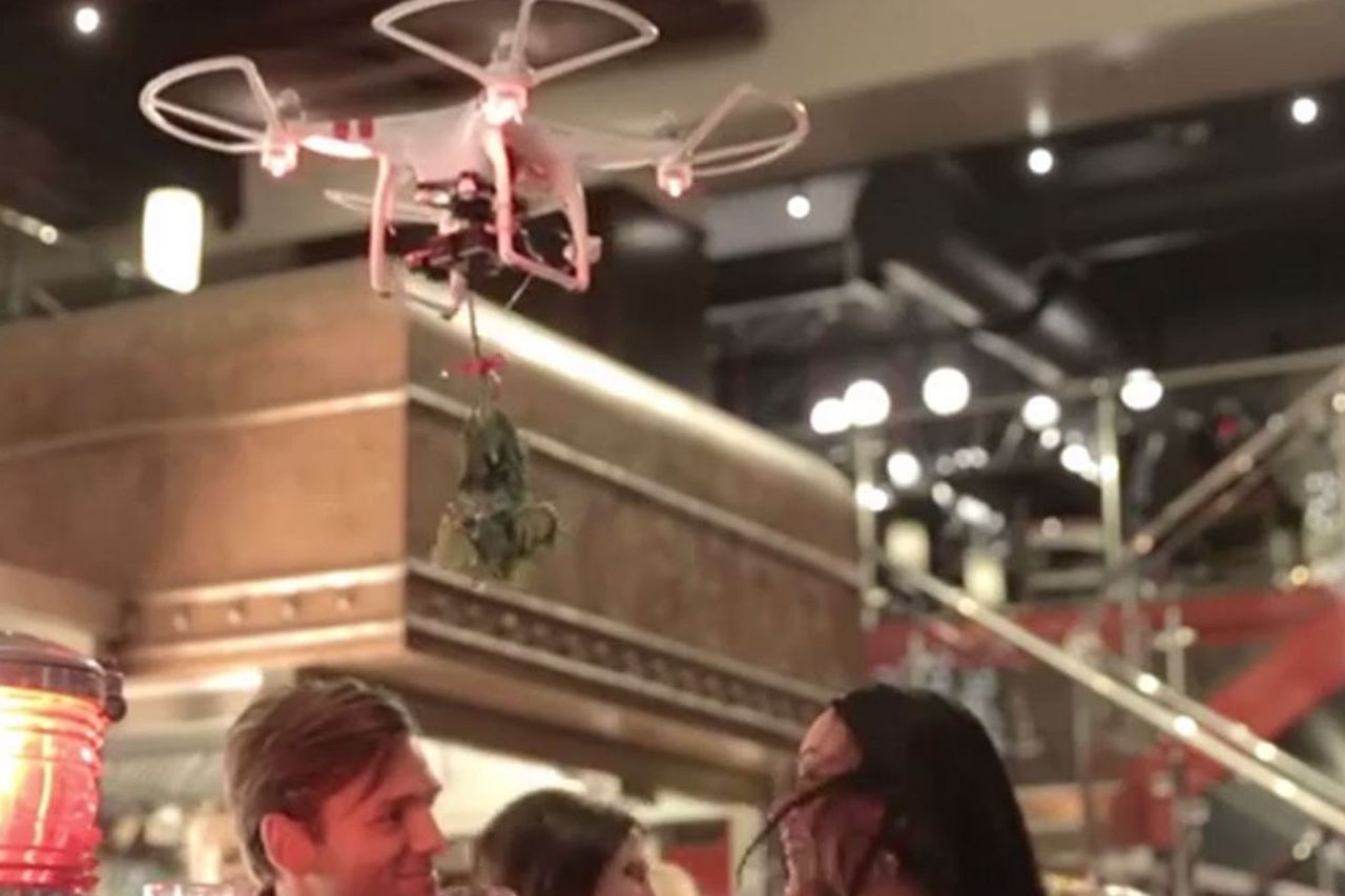 TGI Friday drone yielding mistletoe crashes into woman's face | Irish ...