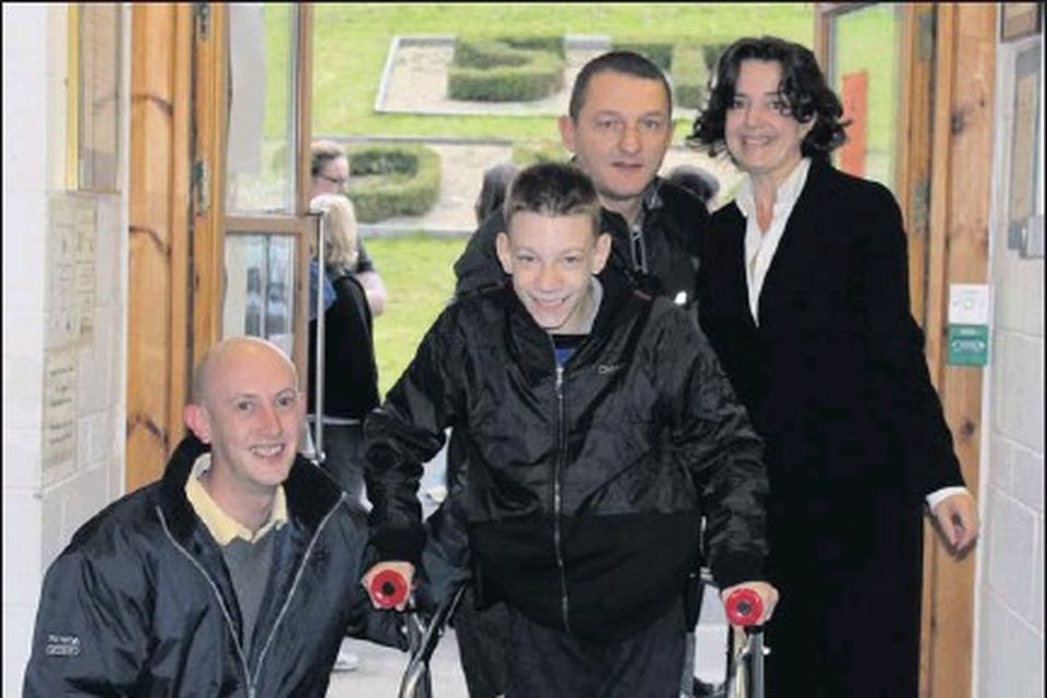 Classmates cheer as Michael walks into school for first time | Irish ...