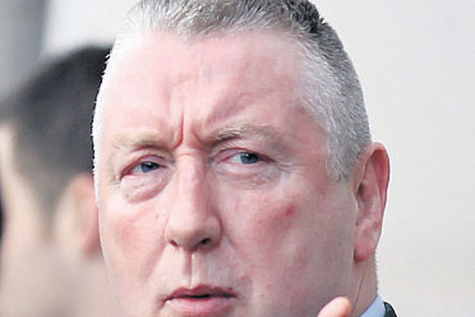 Garda says his career was ruined by claim he put gun in mouth during ...